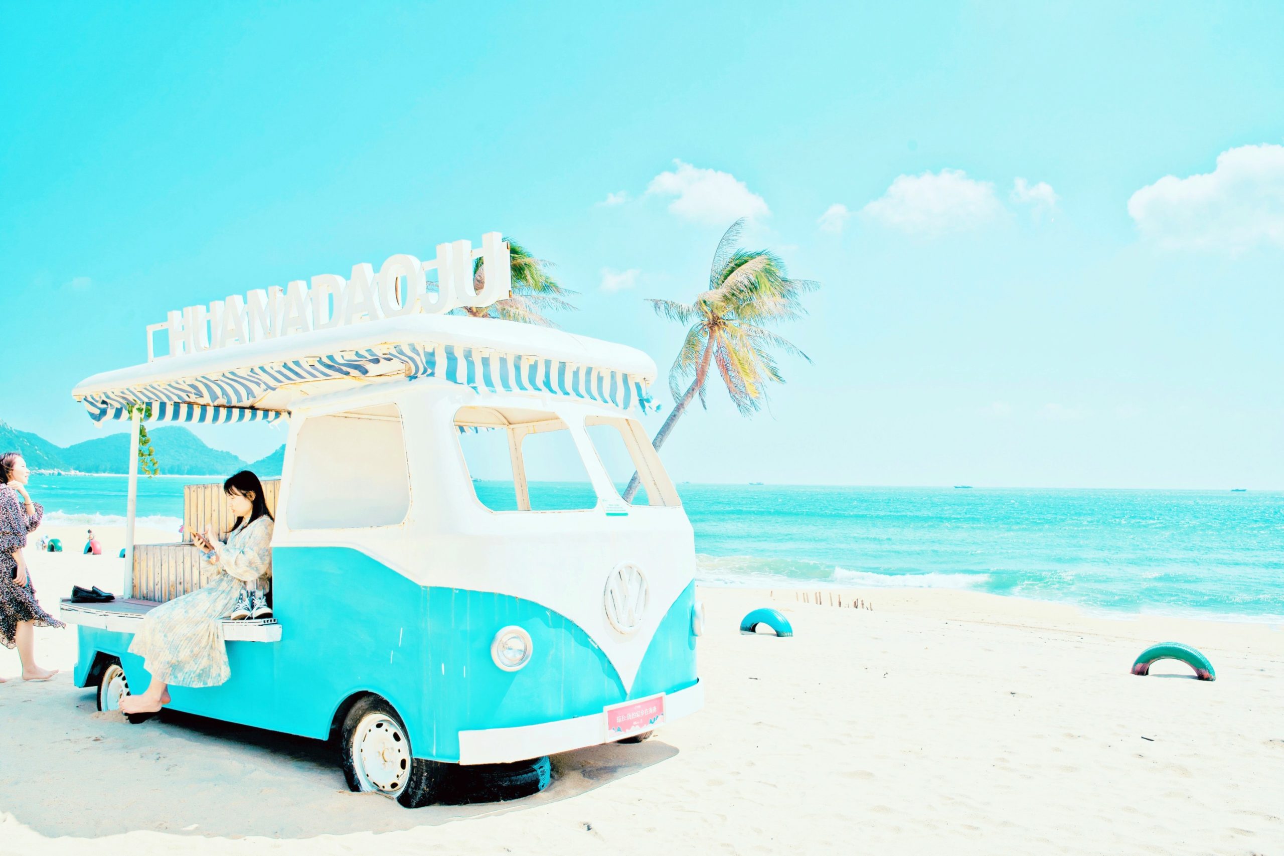 blue camper van on the beach - Faded Spring